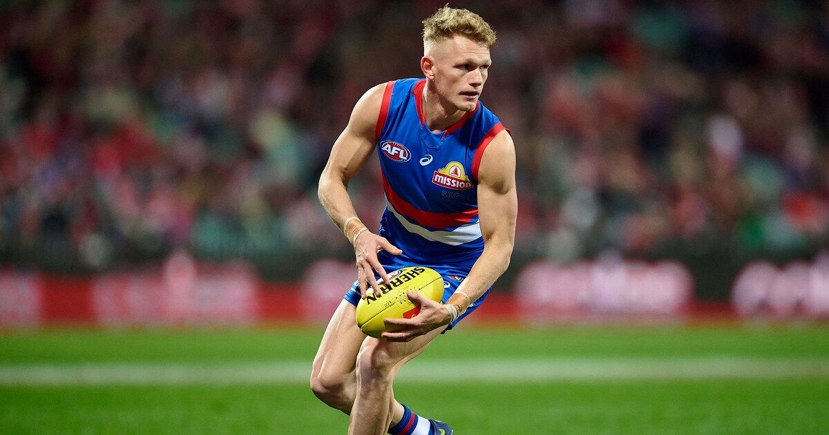 Treloar adding string to bow in backline